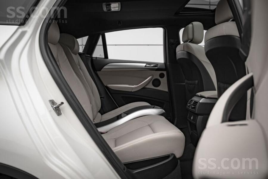 White BMW X6 2010 in Riga, with an engine capacity of 3.00 L and mileage of 239 thousand km for 9990 €, photo 16 on AUTOMOTO.COM.LV