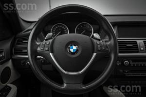 White BMW X6 2010 in Riga, with an engine capacity of 3.00 L and mileage of 239 thousand km for 9990 €, photo 22 on AUTOMOTO.COM.LV