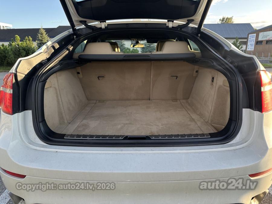 White BMW X6 2010 in Tallinn, with an engine capacity of 3.00 L and mileage of 369 thousand km for 14500 €, photo 7 on AUTOMOTO.COM.LV