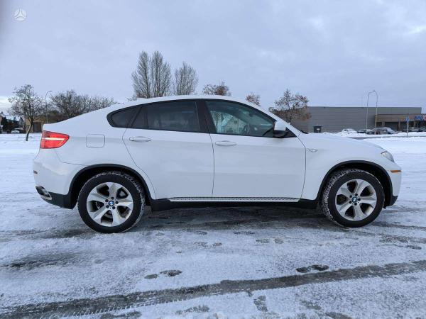 White BMW X6 2011 in Panevezys, with an engine capacity of 2.98 L and mileage of 260 thousand km for 12212 €, photo 4 on AUTOMOTO.COM.LV