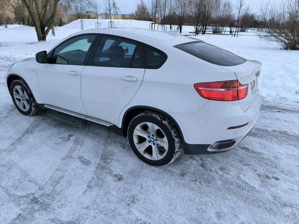 White BMW X6 2011 in Panevezys, with an engine capacity of 2.98 L and mileage of 260 thousand km for 12212 €, photo 9 on AUTOMOTO.COM.LV