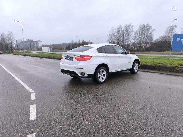 White BMW X6 2011 in Panevezys, with an engine capacity of 2.99 L and mileage of 244 thousand km for 11600 €, photo 8 on AUTOMOTO.COM.LV