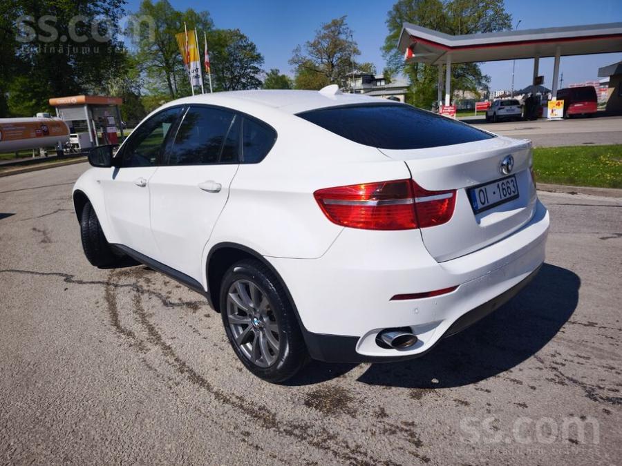 White BMW X6 2011 in Riga, with an engine capacity of 3.00 L and mileage of 205 thousand km for 13299 €, photo 6 on AUTOMOTO.COM.LV