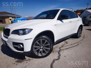 White BMW X6 2011 in Riga, with an engine capacity of 3.00 L and mileage of 205 thousand km for 13299 €, photo 7 on AUTOMOTO.COM.LV