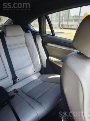 White BMW X6 2011 in Riga, with an engine capacity of 3.00 L and mileage of 205 thousand km for 13299 €, photo 8 on AUTOMOTO.COM.LV