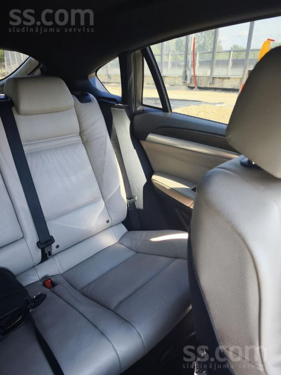 White BMW X6 2011 in Riga, with an engine capacity of 3.00 L and mileage of 205 thousand km for 13299 €, photo 8 on AUTOMOTO.COM.LV
