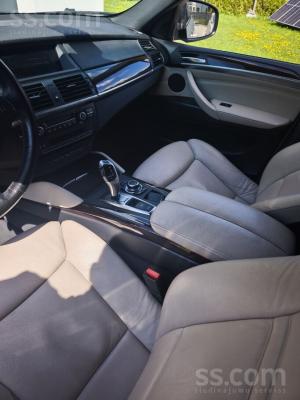 White BMW X6 2011 in Riga, with an engine capacity of 3.00 L and mileage of 205 thousand km for 13299 €, photo 11 on AUTOMOTO.COM.LV