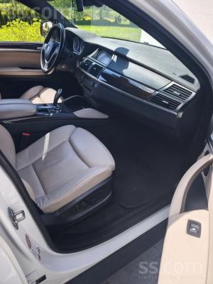 White BMW X6 2011 in Riga, with an engine capacity of 3.00 L and mileage of 205 thousand km for 13299 €, photo 12 on AUTOMOTO.COM.LV