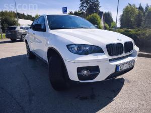 White BMW X6 2011 in Riga, with an engine capacity of 3.00 L and mileage of 205 thousand km for 13299 €, photo 14 on AUTOMOTO.COM.LV