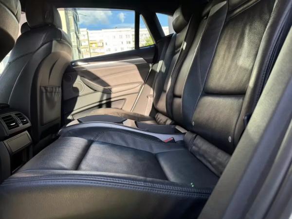 White BMW X6 2011 in Riga, with an engine capacity of 3.00 L and mileage of 235 thousand km for 11990 €, photo 7 on AUTOMOTO.COM.LV