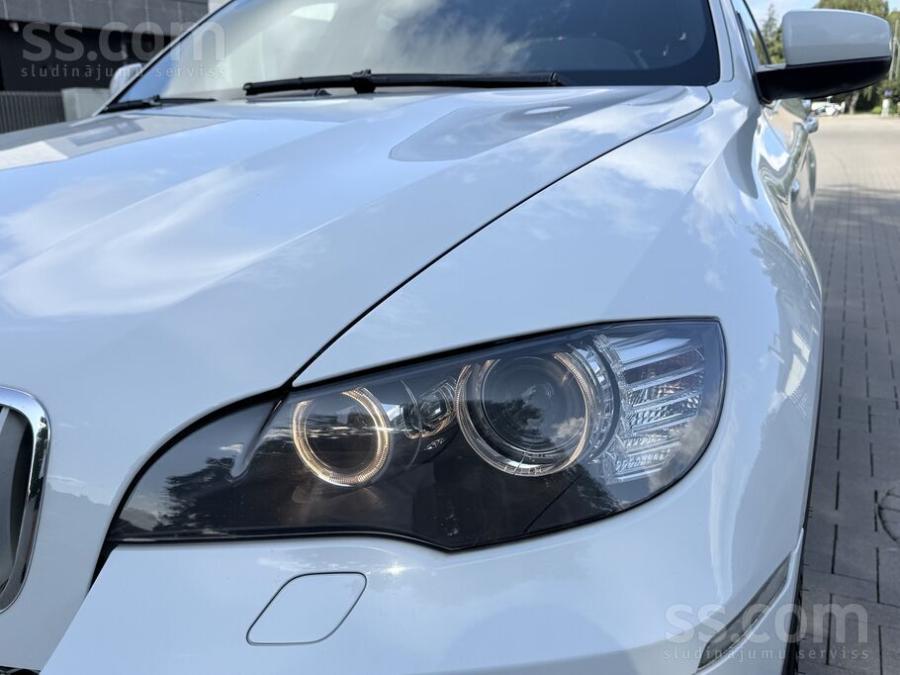 White BMW X6 2011 in Riga, with an engine capacity of 3.00 L and mileage of 312 thousand km for 11500 €, photo 13 on AUTOMOTO.COM.LV