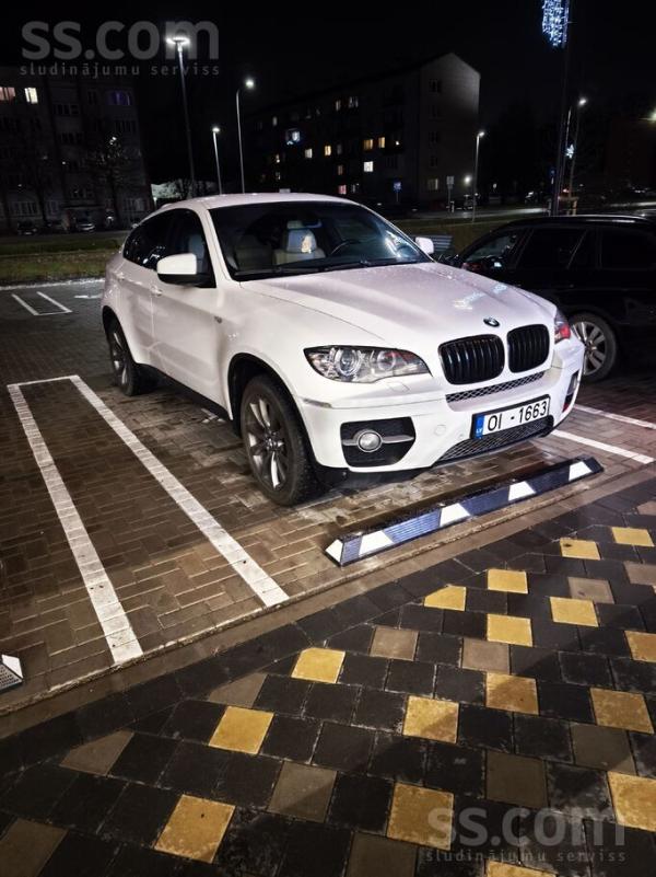 White BMW X6 2012 in Riga, with an engine capacity of 3.00 L and mileage of 190 thousand km for 14987 €, photo 2 on AUTOMOTO.COM.LV
