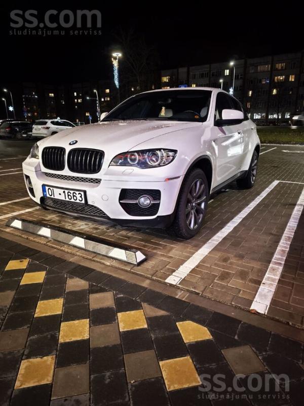 White BMW X6 2012 in Riga, with an engine capacity of 3.00 L and mileage of 190 thousand km for 14987 €, photo 6 on AUTOMOTO.COM.LV