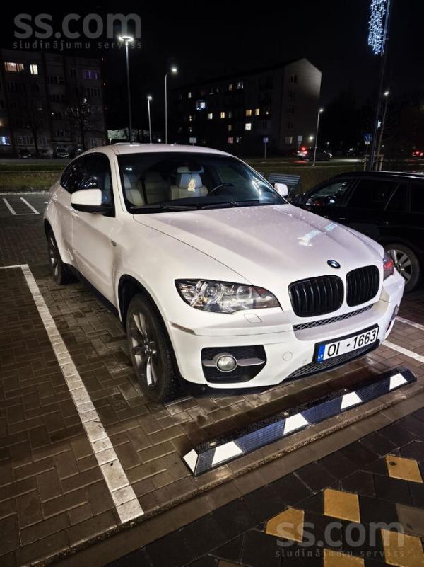 White BMW X6 2012 in Riga, with an engine capacity of 3.00 L and mileage of 190 thousand km for 14987 €, photo 7 on AUTOMOTO.COM.LV