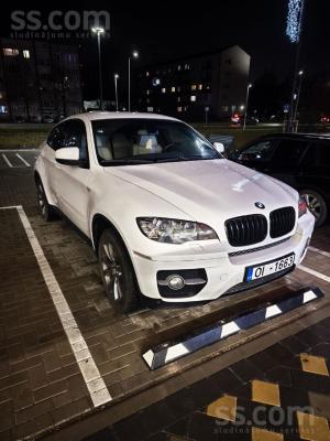White BMW X6 2012 in Riga, with an engine capacity of 3.00 L and mileage of 190 thousand km for 14987 €, photo 7 on AUTOMOTO.COM.LV