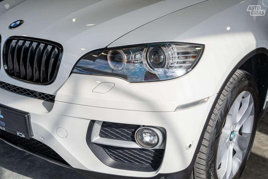 White BMW X6 2013 in Marijampole, with an engine capacity of 3.00 L and mileage of 155 thousand km for 16550 €, photo 5 on AUTOMOTO.COM.LV