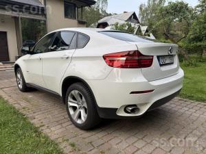 White BMW X6 2014 in Riga, with an engine capacity of 3.00 L and mileage of 181 thousand km for 16500 €, photo 2 on AUTOMOTO.COM.LV