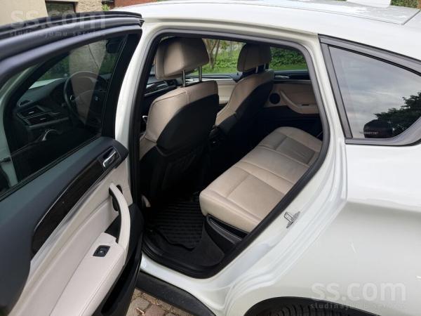 White BMW X6 2014 in Riga, with an engine capacity of 3.00 L and mileage of 181 thousand km for 16500 €, photo 7 on AUTOMOTO.COM.LV