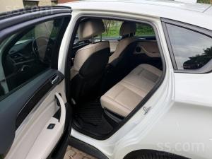 White BMW X6 2014 in Riga, with an engine capacity of 3.00 L and mileage of 181 thousand km for 16500 €, photo 7 on AUTOMOTO.COM.LV