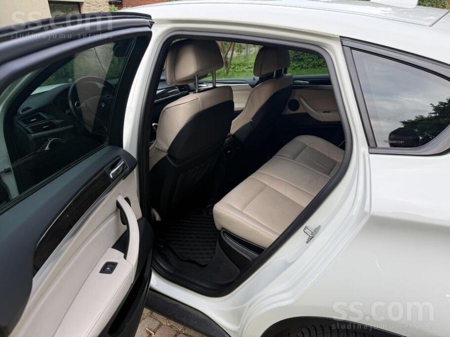 White BMW X6 2014 in Riga, with an engine capacity of 3.00 L and mileage of 181 thousand km for 16500 €, photo 7 on AUTOMOTO.COM.LV