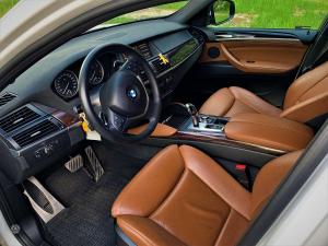 White BMW X6 2014 in Vilnius, with an engine capacity of 2.99 L and mileage of 289 thousand km for 15900 €, photo 11 on AUTOMOTO.COM.LV