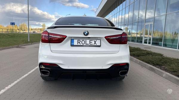 White BMW X6 2014 in Rezekne, with an engine capacity of 2.99 L and mileage of 285 thousand km for 20490 €, photo 4 on AUTOMOTO.COM.LV