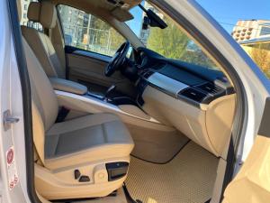 White BMW X6 2014 in Riga, with an engine capacity of 3.00 L and mileage of 142 thousand km for 20950 €, photo 10 on AUTOMOTO.COM.LV