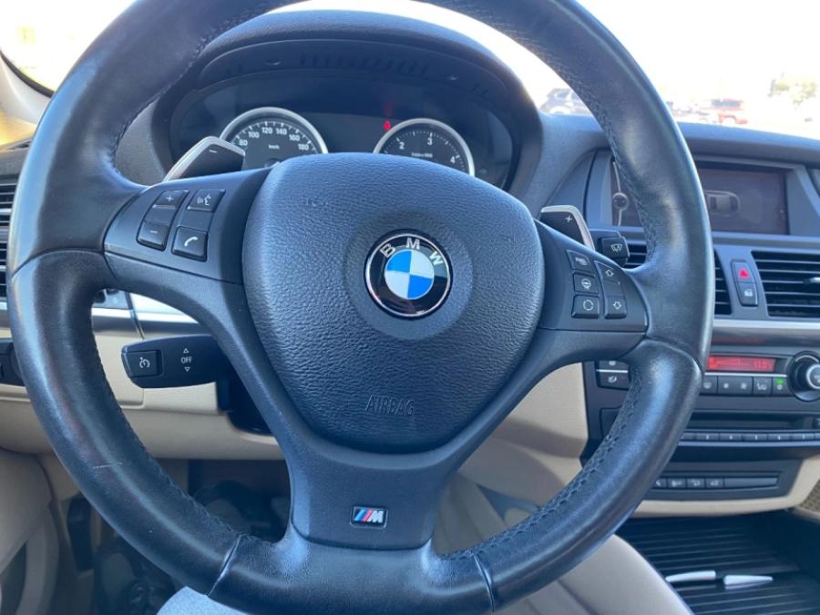 White BMW X6 2014 in Riga, with an engine capacity of 3.00 L and mileage of 142 thousand km for 20950 €, photo 13 on AUTOMOTO.COM.LV