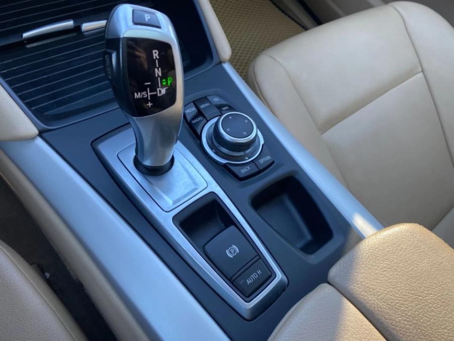 White BMW X6 2014 in Riga, with an engine capacity of 3.00 L and mileage of 142 thousand km for 20950 €, photo 16 on AUTOMOTO.COM.LV