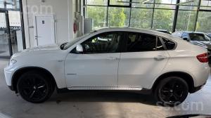 White BMW X6 2014 in Riga, with an engine capacity of 3.00 L and mileage of 231 thousand km for 12900 €, photo 3 on AUTOMOTO.COM.LV