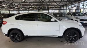 White BMW X6 2014 in Riga, with an engine capacity of 3.00 L and mileage of 231 thousand km for 12900 €, photo 6 on AUTOMOTO.COM.LV