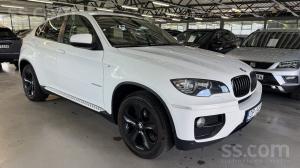 White BMW X6 2014 in Riga, with an engine capacity of 3.00 L and mileage of 231 thousand km for 12900 €, photo 7 on AUTOMOTO.COM.LV