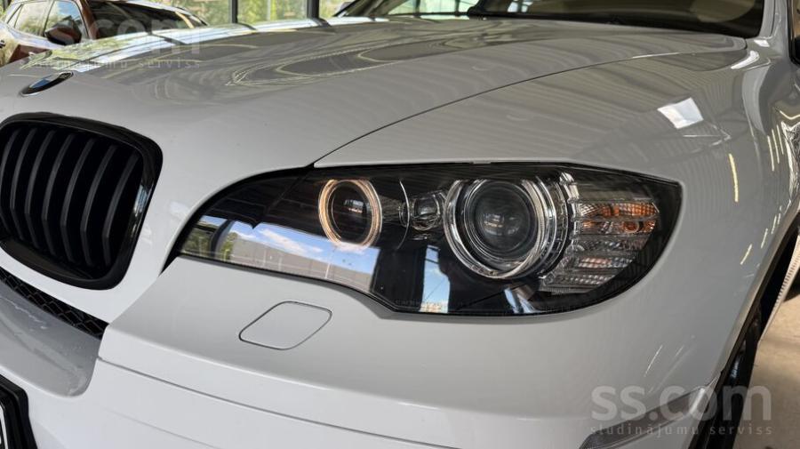 White BMW X6 2014 in Riga, with an engine capacity of 3.00 L and mileage of 231 thousand km for 12900 €, photo 9 on AUTOMOTO.COM.LV