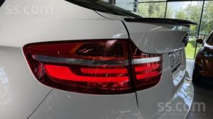 White BMW X6 2014 in Riga, with an engine capacity of 3.00 L and mileage of 231 thousand km for 12900 €, photo 10 on AUTOMOTO.COM.LV