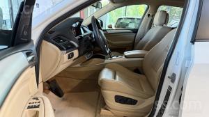 White BMW X6 2014 in Riga, with an engine capacity of 3.00 L and mileage of 231 thousand km for 12900 €, photo 11 on AUTOMOTO.COM.LV