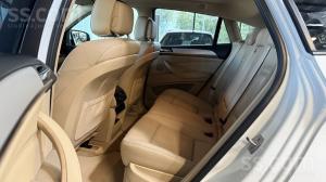White BMW X6 2014 in Riga, with an engine capacity of 3.00 L and mileage of 231 thousand km for 12900 €, photo 14 on AUTOMOTO.COM.LV