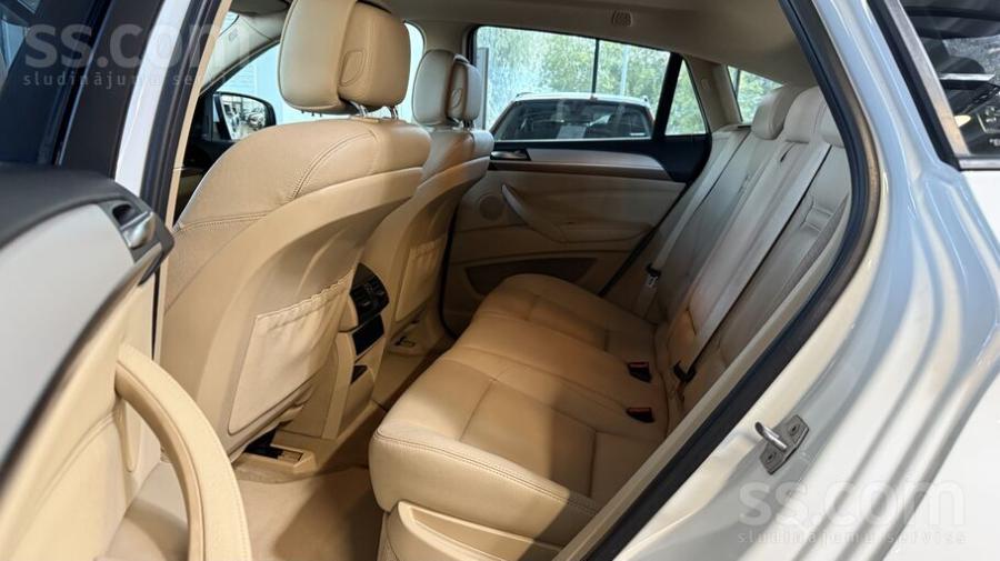 White BMW X6 2014 in Riga, with an engine capacity of 3.00 L and mileage of 231 thousand km for 12900 €, photo 14 on AUTOMOTO.COM.LV