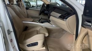 White BMW X6 2014 in Riga, with an engine capacity of 3.00 L and mileage of 231 thousand km for 12900 €, photo 18 on AUTOMOTO.COM.LV