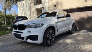 White BMW X6 2015 in Riga, with an engine capacity of 3.00 L and mileage of 190 thousand km for 36400 €, photo 1 on AUTOMOTO.COM.LV