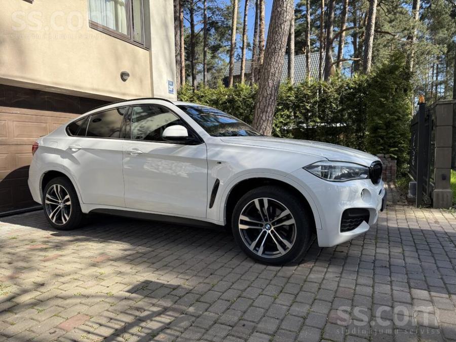 White BMW X6 2015 in Riga, with an engine capacity of 3.00 L and mileage of 190 thousand km for 36400 €, photo 3 on AUTOMOTO.COM.LV