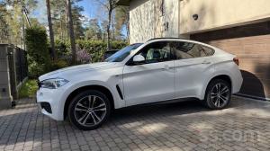 White BMW X6 2015 in Riga, with an engine capacity of 3.00 L and mileage of 190 thousand km for 36400 €, photo 4 on AUTOMOTO.COM.LV