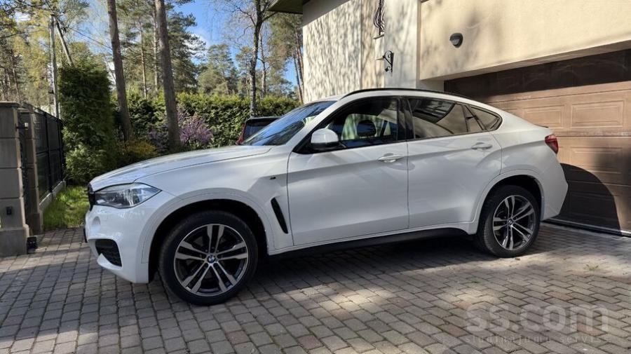 White BMW X6 2015 in Riga, with an engine capacity of 3.00 L and mileage of 190 thousand km for 36400 €, photo 4 on AUTOMOTO.COM.LV