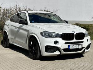 White BMW X6 2015 in Riga, with an engine capacity of 3.00 L and mileage of 185 thousand km for 23900 €, photo 3 on AUTOMOTO.COM.LV
