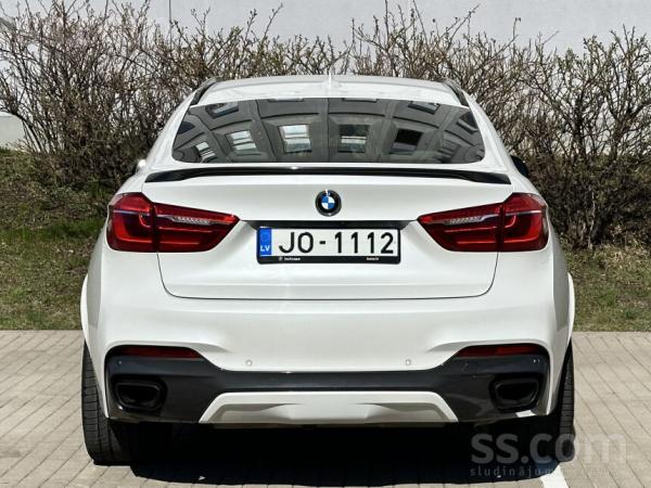 White BMW X6 2015 in Riga, with an engine capacity of 3.00 L and mileage of 185 thousand km for 24900 €, photo 6 on AUTOMOTO.COM.LV
