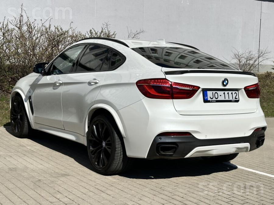White BMW X6 2015 in Riga, with an engine capacity of 3.00 L and mileage of 185 thousand km for 23900 €, photo 8 on AUTOMOTO.COM.LV