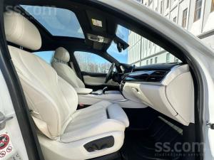 White BMW X6 2015 in Riga, with an engine capacity of 3.00 L and mileage of 185 thousand km for 23900 €, photo 12 on AUTOMOTO.COM.LV