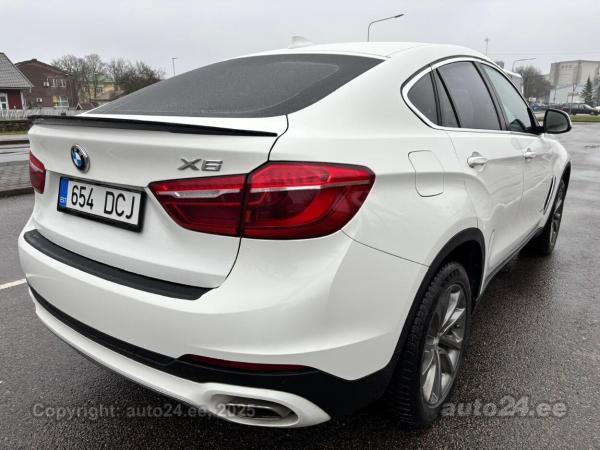 White BMW X6 2015 in Paide, with an engine capacity of 3.00 L and mileage of 175 thousand km for 23990 €, photo 4 on AUTOMOTO.COM.LV