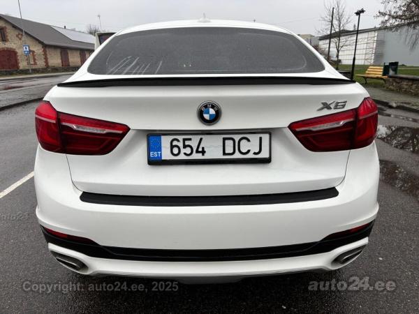 White BMW X6 2015 in Paide, with an engine capacity of 3.00 L and mileage of 175 thousand km for 23990 €, photo 5 on AUTOMOTO.COM.LV