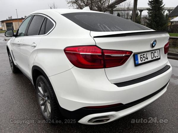White BMW X6 2015 in Paide, with an engine capacity of 3.00 L and mileage of 175 thousand km for 23990 €, photo 6 on AUTOMOTO.COM.LV