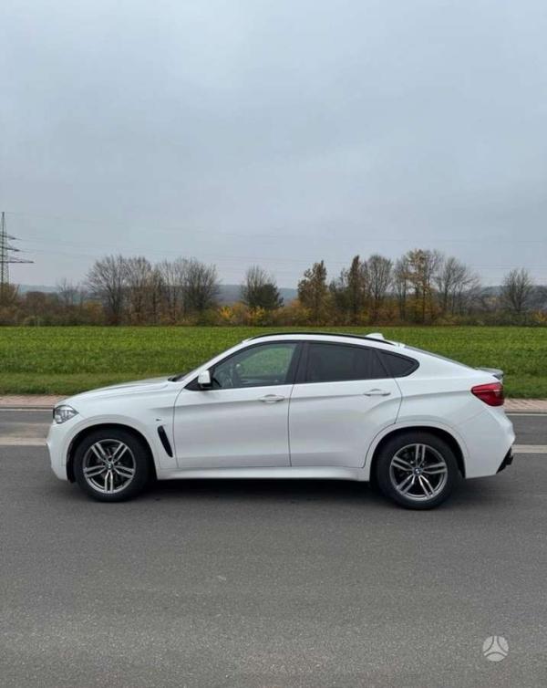 White BMW X6 2015 in Kaunas, with an engine capacity of 2.99 L and mileage of 218 thousand km for 22300 €, photo 4 on AUTOMOTO.COM.LV